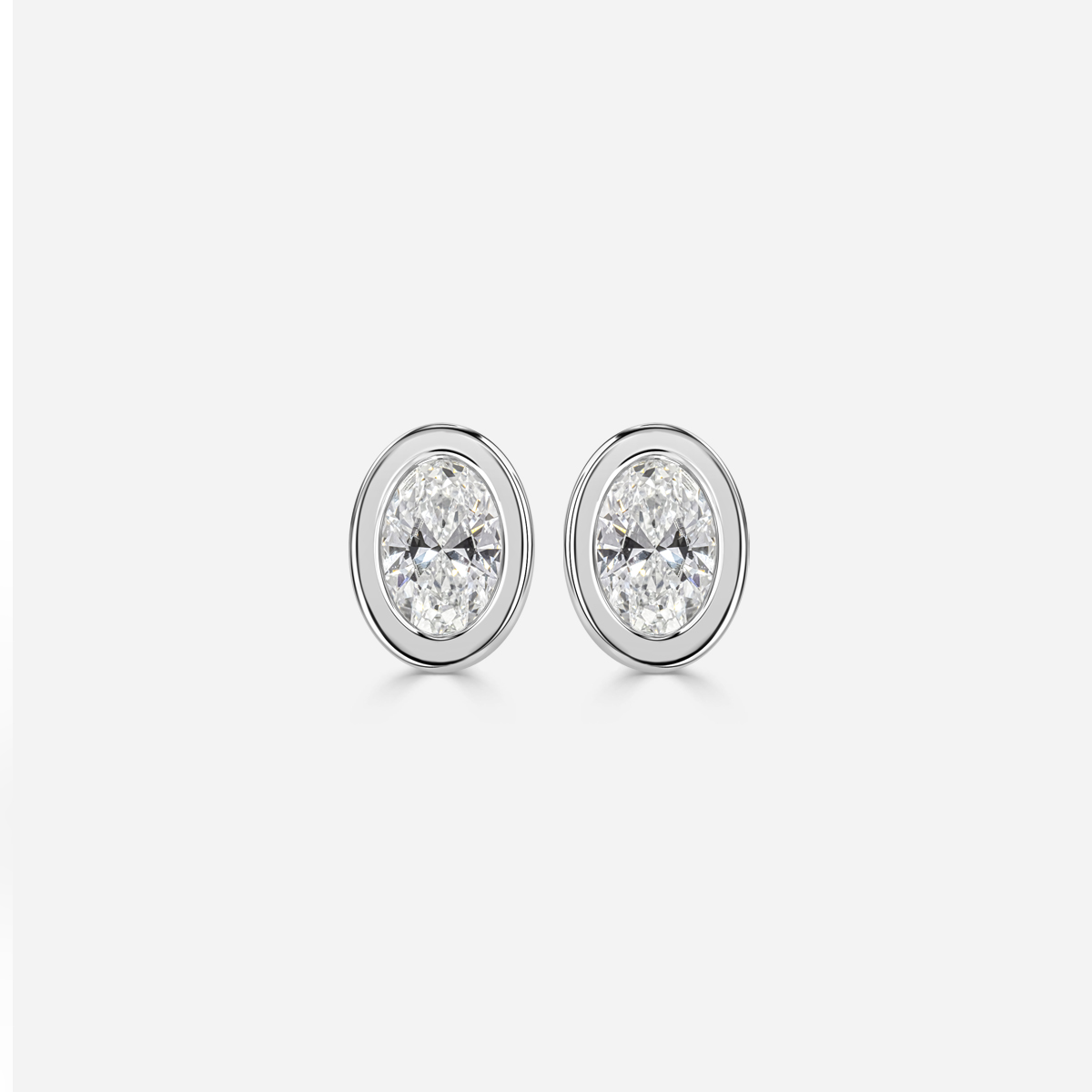 Bezel Set Oval Cut Diamond Studs In Platinum - Flawless Fine Jewellery