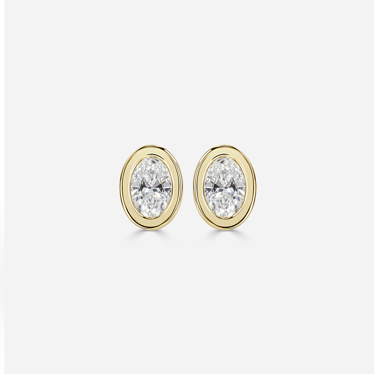 Bezel Set Oval Cut Diamond Studs In Yellow Gold - Flawless Fine Jewellery